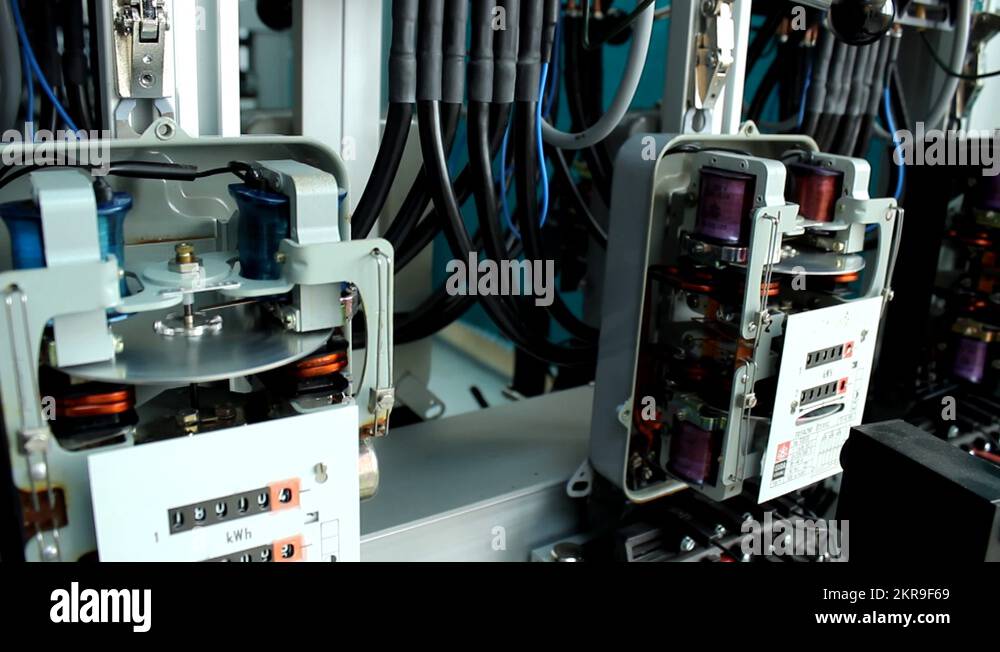 Electricity meter with scale and rotating wheel Stock Video Footage - Alamy