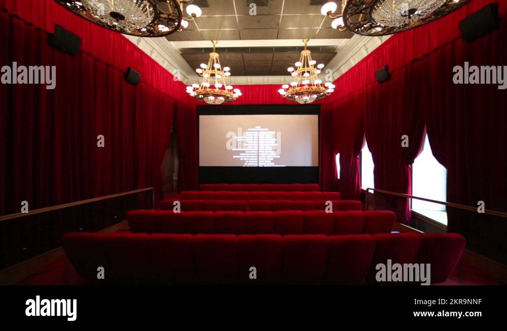 Big red hall and screen with titers in cinema at GUM Stock Video ...