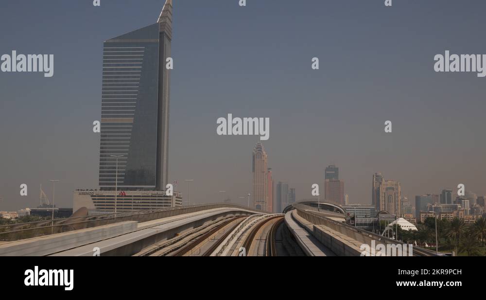 Ultra HD 4K Arenco Tower Skyscraper Dubai POV Metro Train Passing High ...