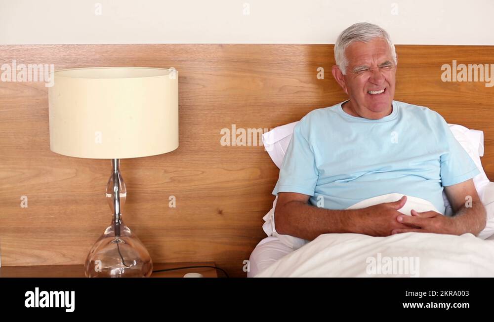 Heart attack man bed Stock Videos & Footage - HD and 4K Video Clips - Alamy