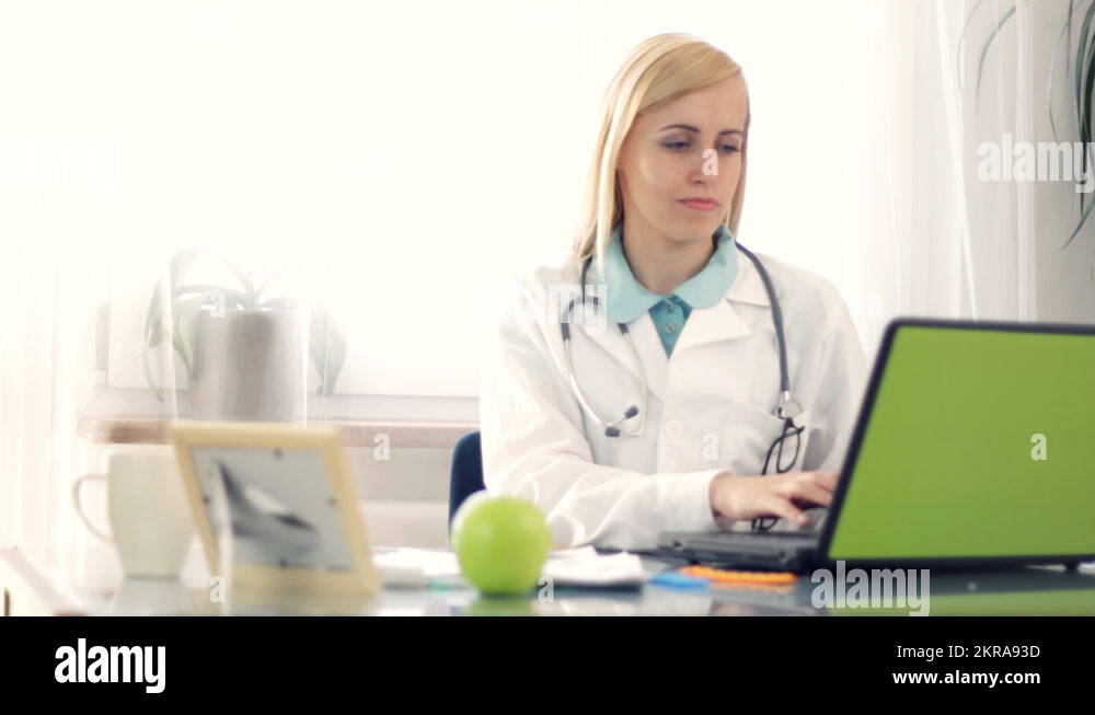 Female doctor in the office gets xray photo of human lungs HD Stock ...