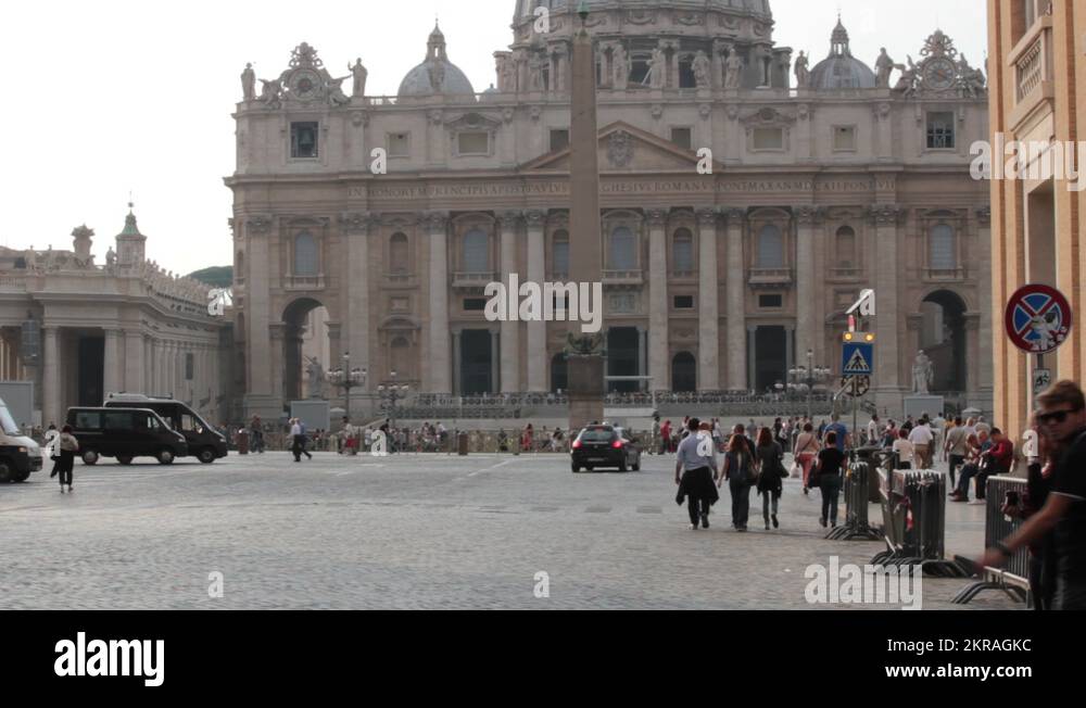 pedestrians and autos on the road to st. peter's square and vatican ...