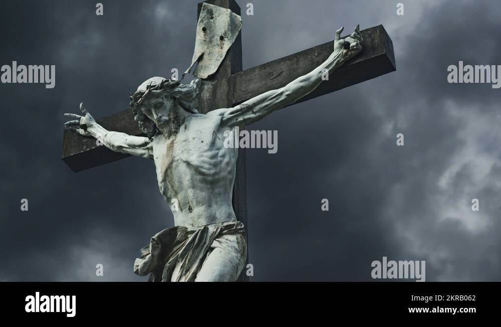 Crucifixion. Christian cross with Jesus Christ statue Stock Video Footage - Alamy