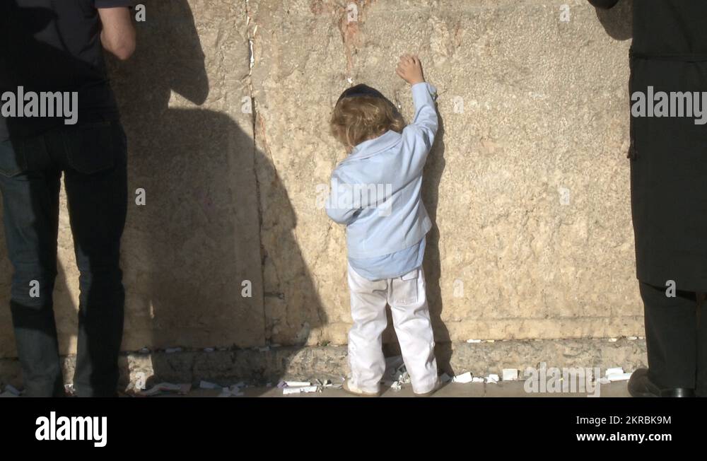 Cute jewish kid at the western wall Stock Video Footage - Alamy