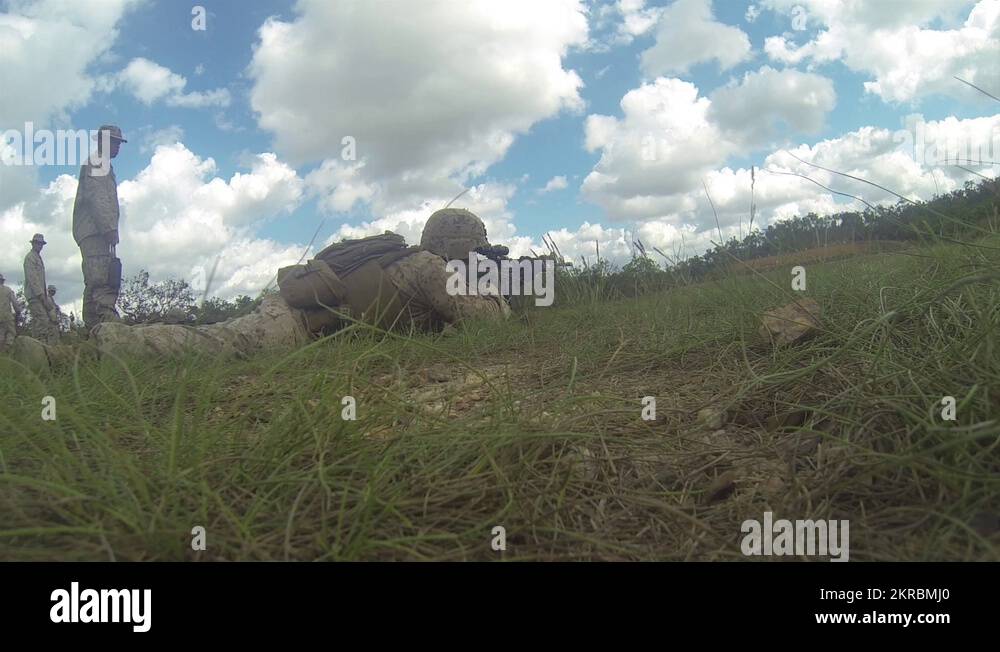 US Army soldier aims his weapon at firing range in joint training ...