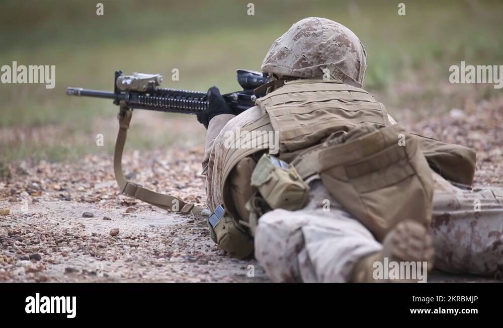 US Army soldier aims his weapon at joint training exercise (courtesy ...