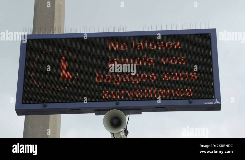 dual language baggage warning sign at ferry docks, calais, france Stock ...