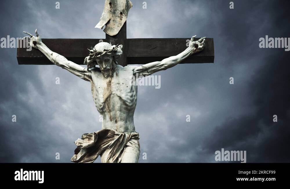Crucifixion. Christian cross with crucified Jesus Christ statue Stock Video Footage - Alamy