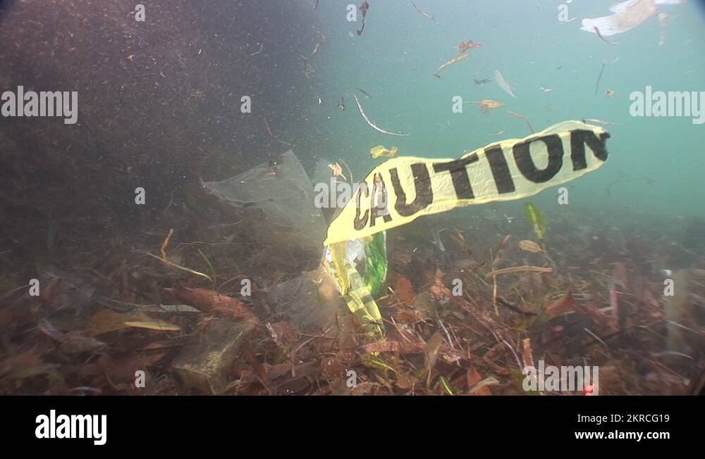 Harbour Rubbish - Discarded plastic pollution including CAUTION tape ...