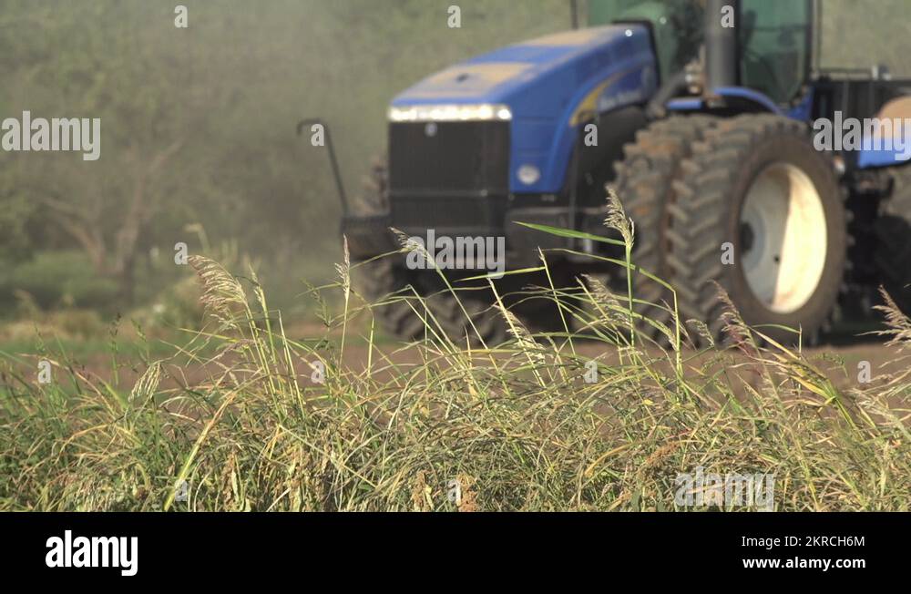 Tractor Discing Field on Farm Stock Video Footage - Alamy