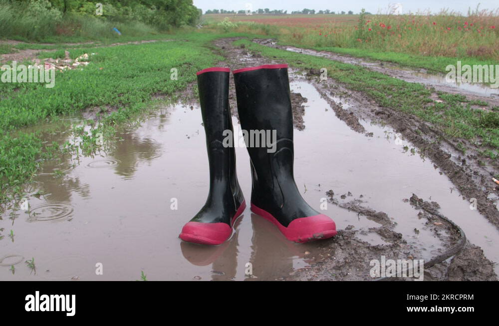 Muddy rain boots Stock Videos & Footage - HD and 4K Video Clips - Alamy