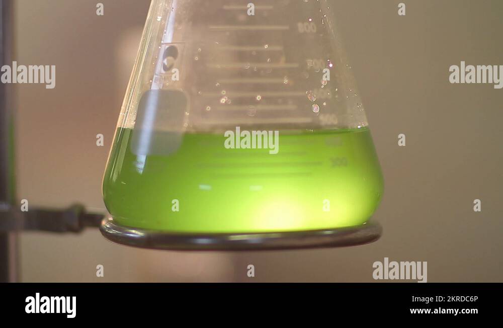 Pouring chemical into flask Stock Videos & Footage - HD and 4K Video ...