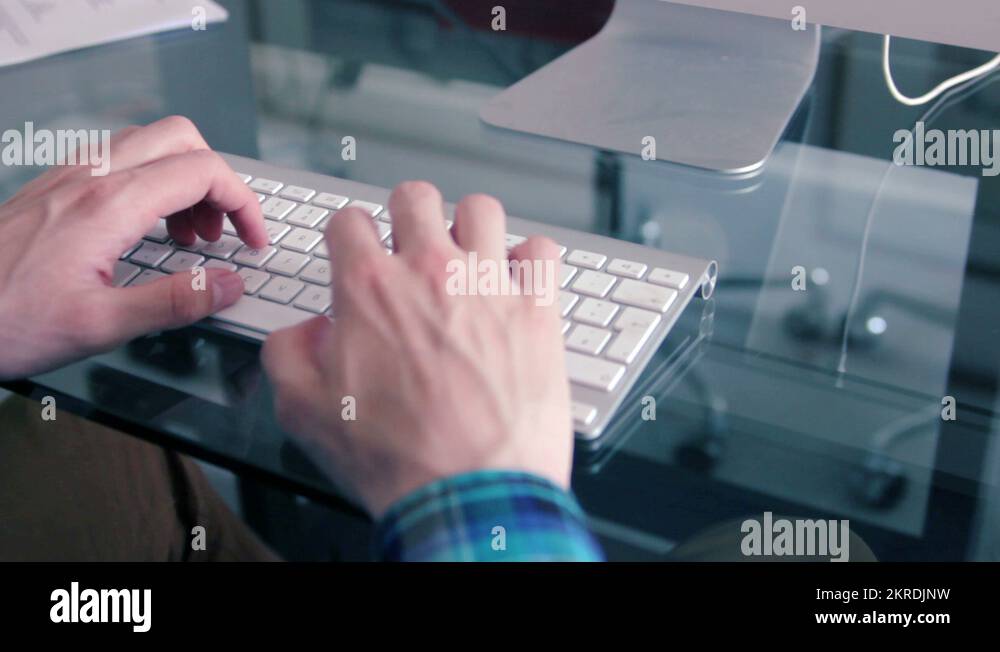 Man typing in an Apple keyboard Stock Video Footage - Alamy