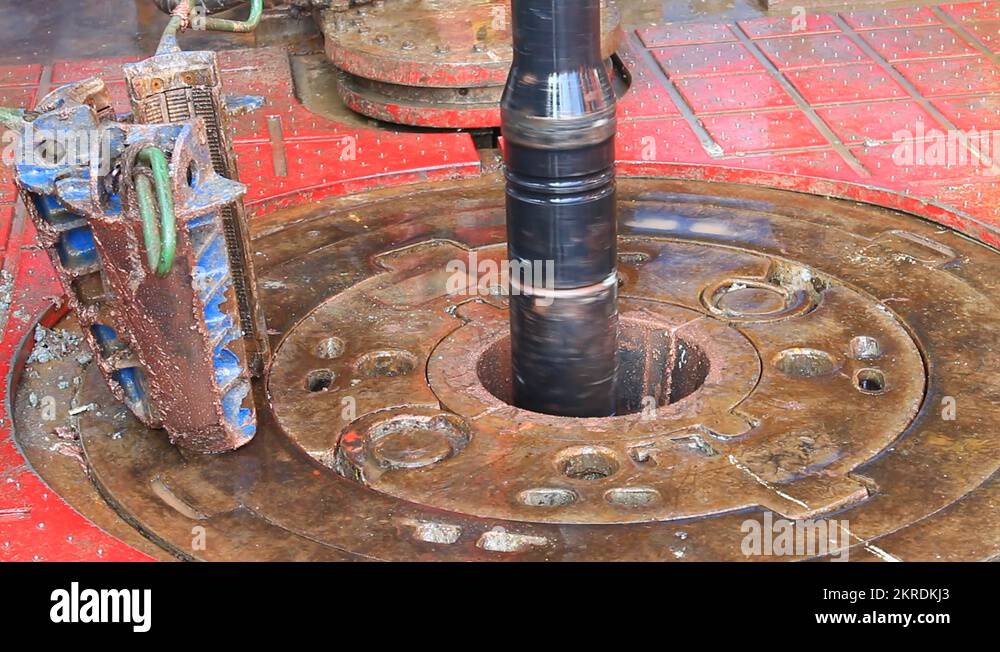 Slip on the rotary table while drilling oil well and pipe being rotated ...