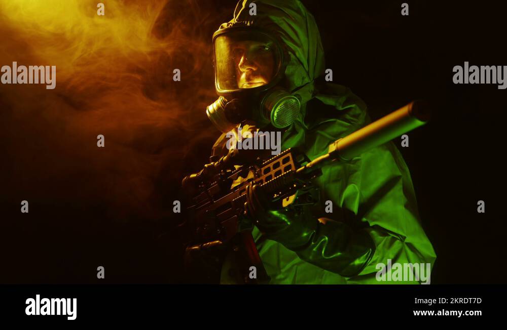soldier in a chemical suit standing guard with his rifle Stock Video ...