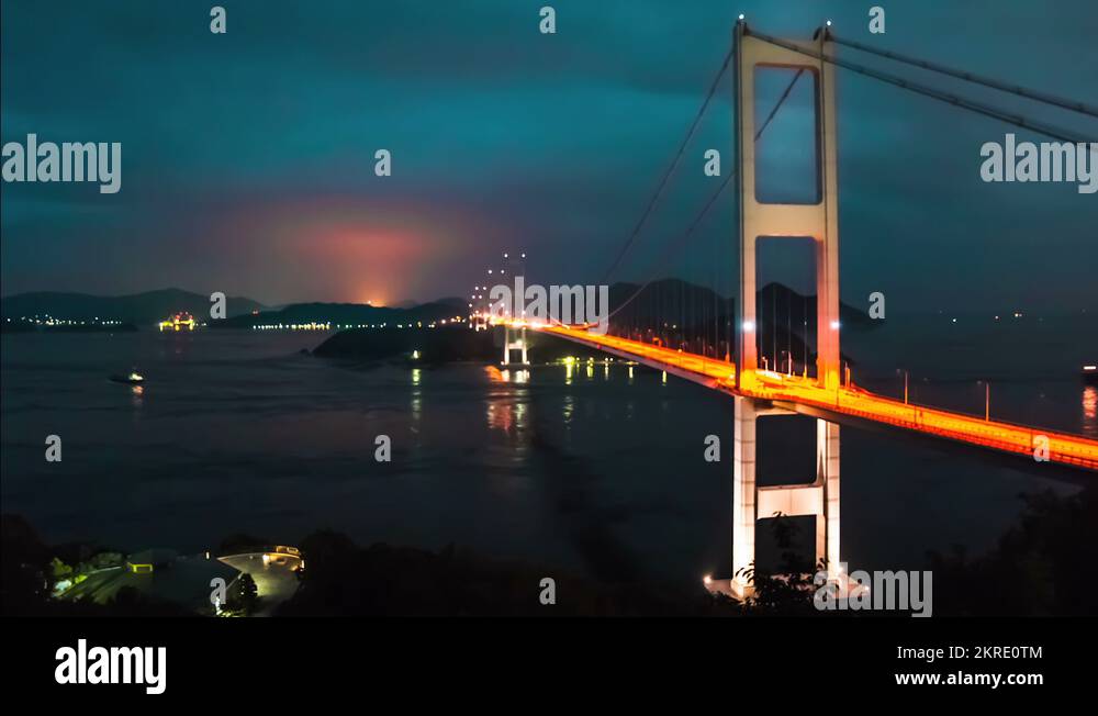 Time lapse of Japanese boats underneath the giant suspension bridges of ...