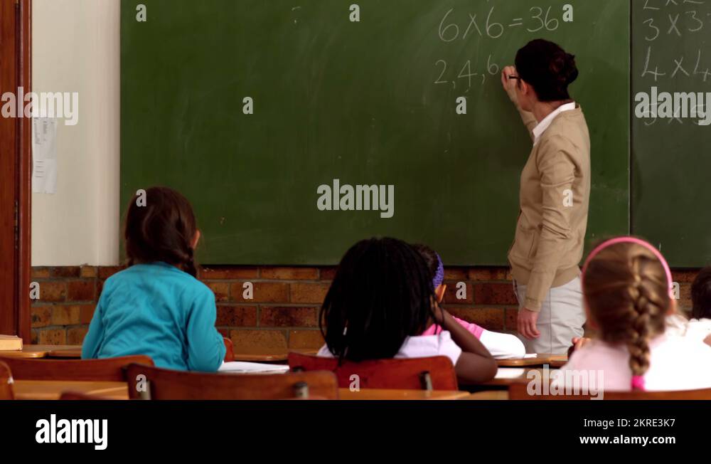 Teacher teaching math in classroom Stock Videos & Footage - HD and 4K ...