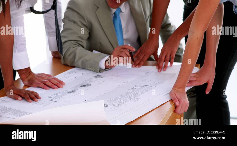 Businesspeople looking blueprints Stock Videos & Footage - HD and 4K ...