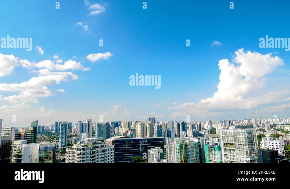 4k UHD time lapse video of skyline in a clear blue sky, Singapore (TL ...