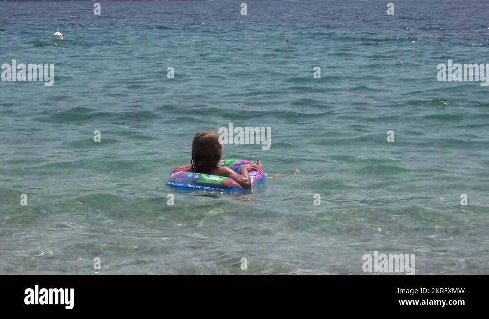 4K Child, Girl Swimming in Sea Water on Beach, Kid Playing, Bathing on ...