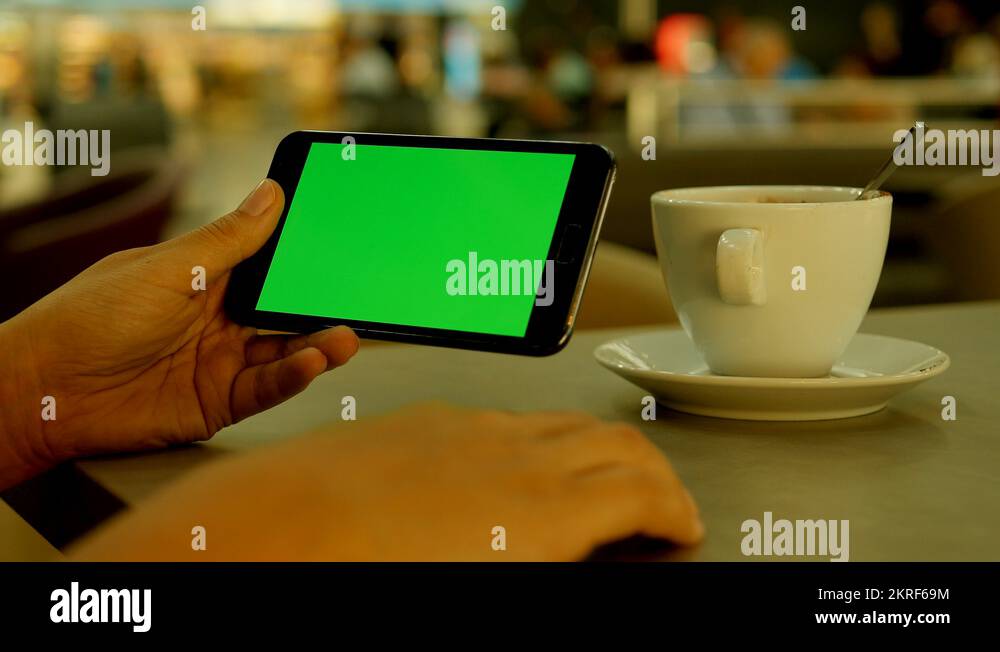 tablet phone with green screen - isolated display - cafe cafeteria ...