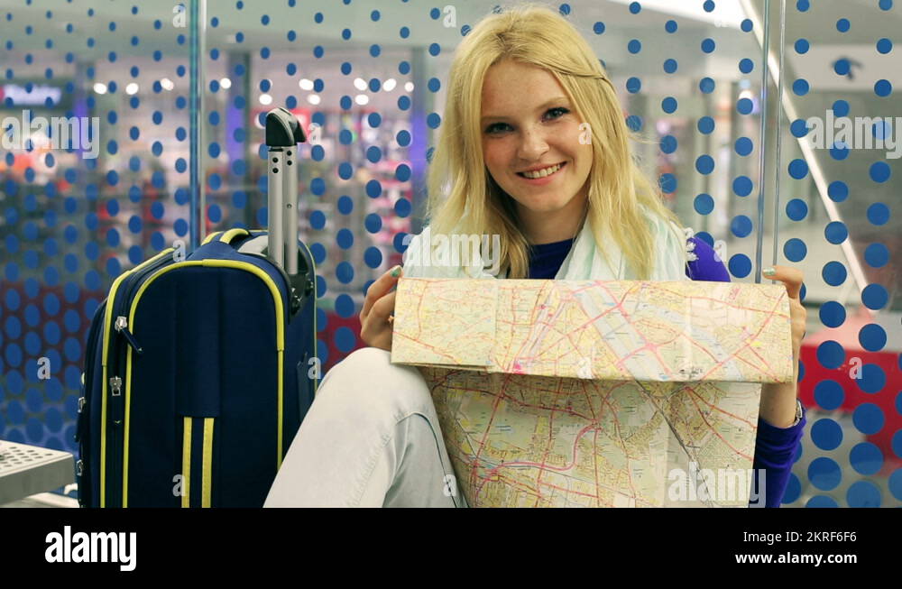 Girl reading map Stock Videos & Footage - HD and 4K Video Clips - Alamy