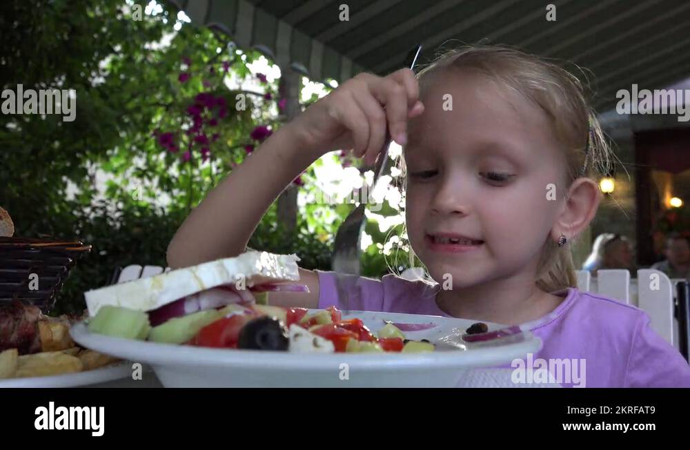 Child Eating Greek Salad, Kid, Little Girl at Restaurant, Bar, House ...