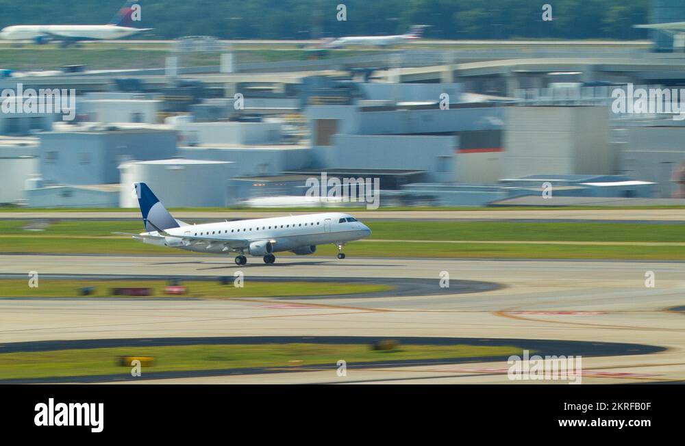 Generic Airliner Taking Off from ATL into Blue Sky Stock Video Footage ...