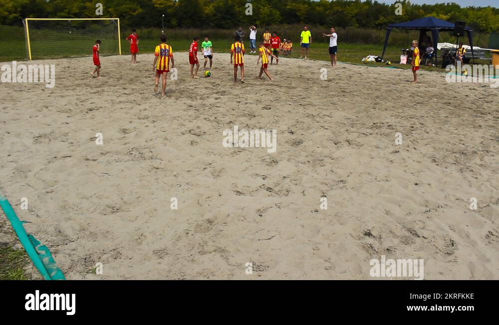football kids playing game in the sand ,kids enjoy in sport Stock Video ...