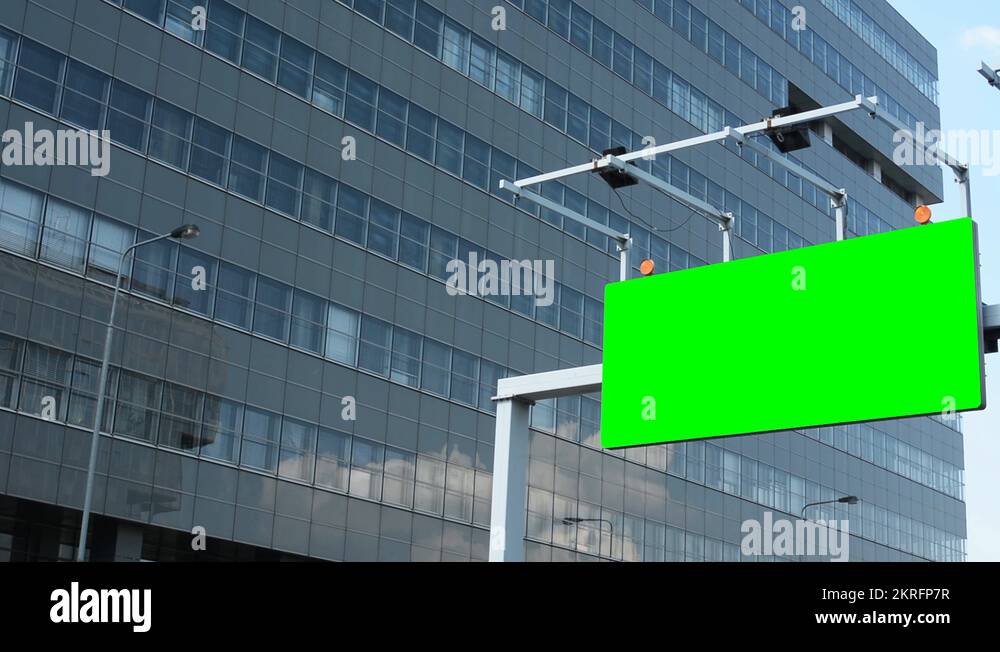 traffic signs - green screen - modern buildings in background (offices ...