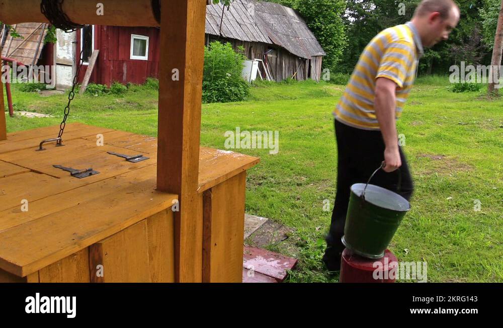 Man bucket water Stock Videos & Footage - HD and 4K Video Clips - Alamy