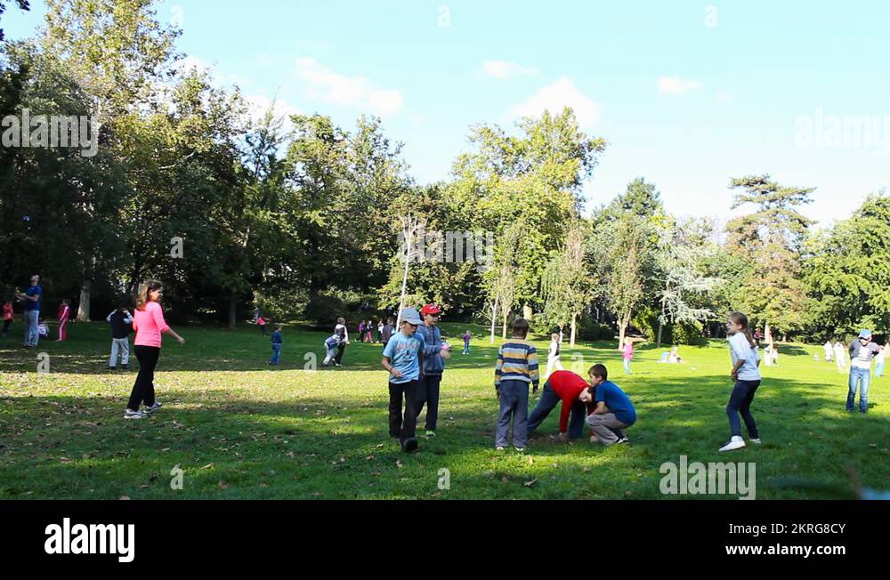 Kids on grass Stock Videos & Footage - HD and 4K Video Clips - Alamy