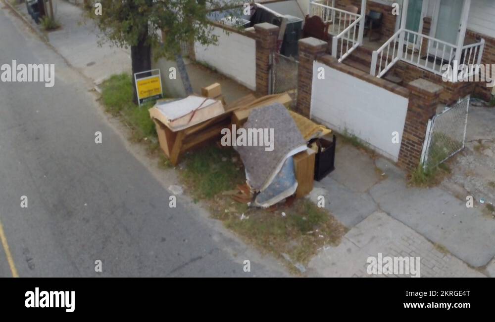 House left abandoned with its junk on the sidewalk (2 of 2 Stock Video ...