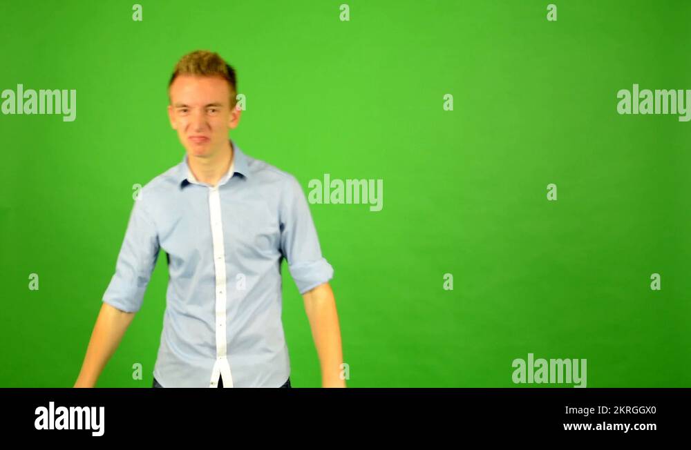 man - green screen - portrait - man agrees (shows thumbs up for ...