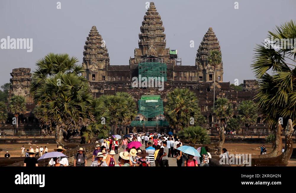 People visit Angkor Wat Temple, Cambodia, The World's Largest Religious ...