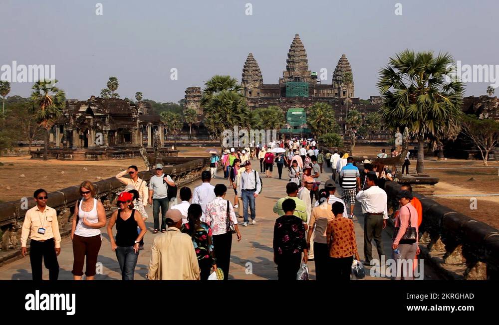 People visit Angkor Wat Temple, Cambodia, The World's Largest Religious ...