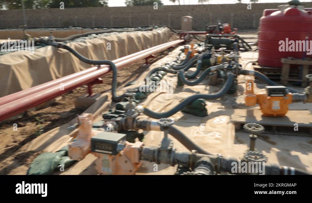 Pan of Piping and In-Ground Fuel Bladders at Airport Fuel Depot Stock ...
