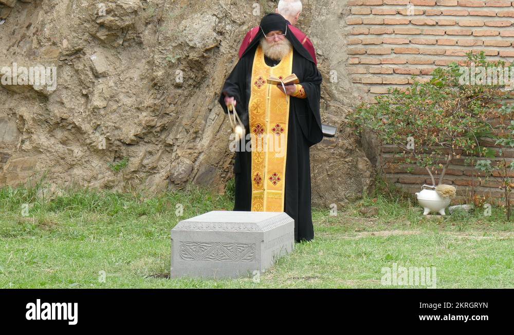 Burial funeral priest Stock Videos & Footage - HD and 4K Video Clips ...