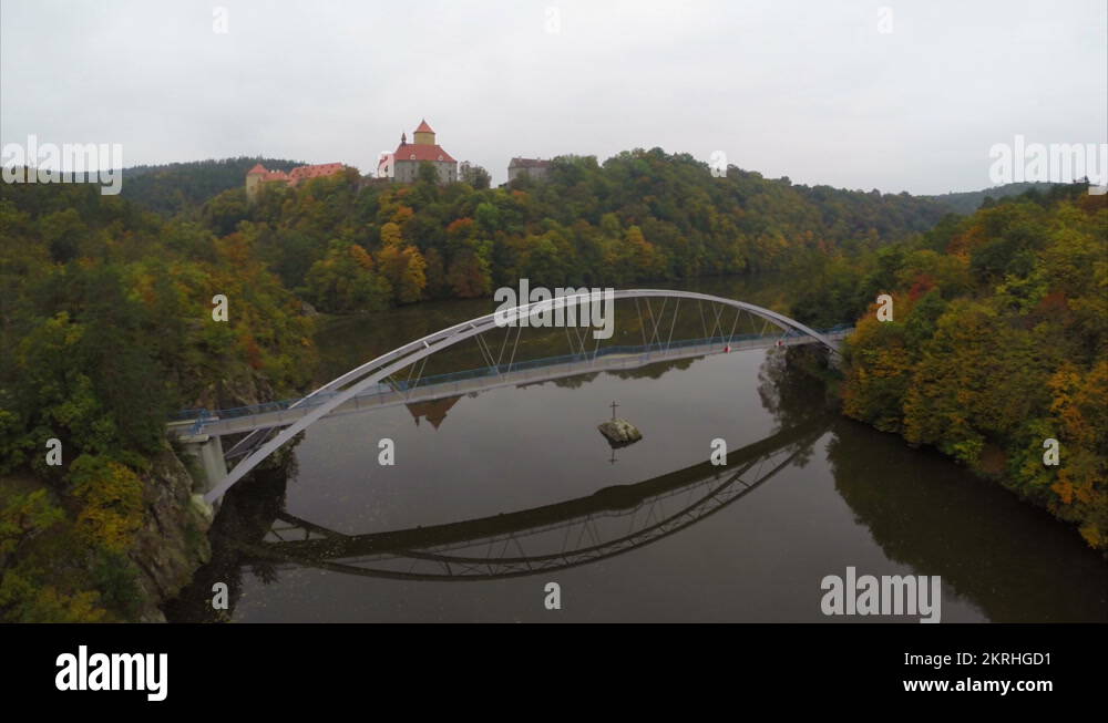 Long aerial fly to ancient medieval castle river bridge, fall Stock ...