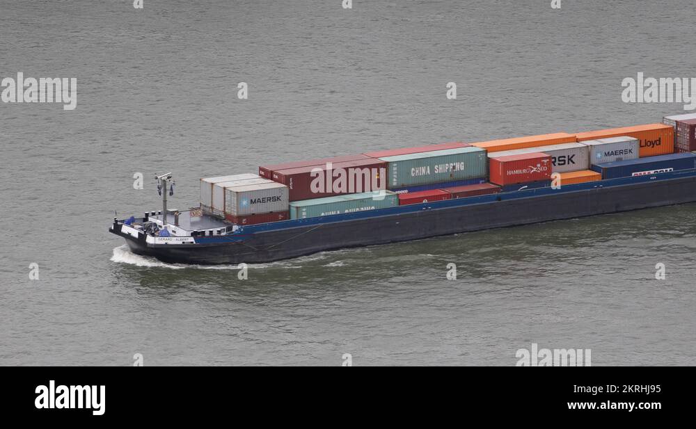 UltraHD 4K Fluvial Cargo Tug Boat Passing Container Ship China Shipping ...