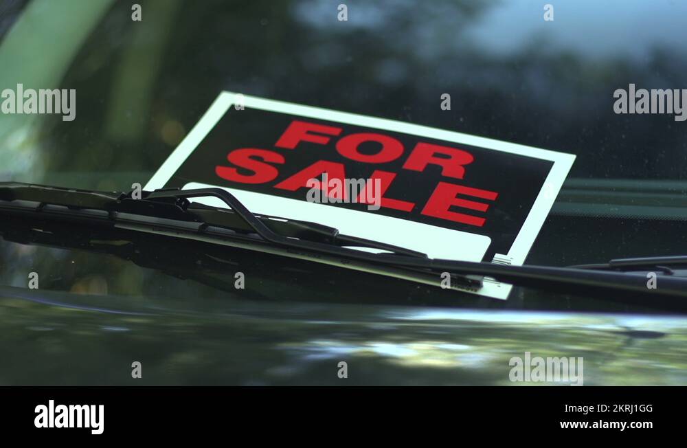 For Sale sign in a car window - dolly reveal Stock Video Footage - Alamy