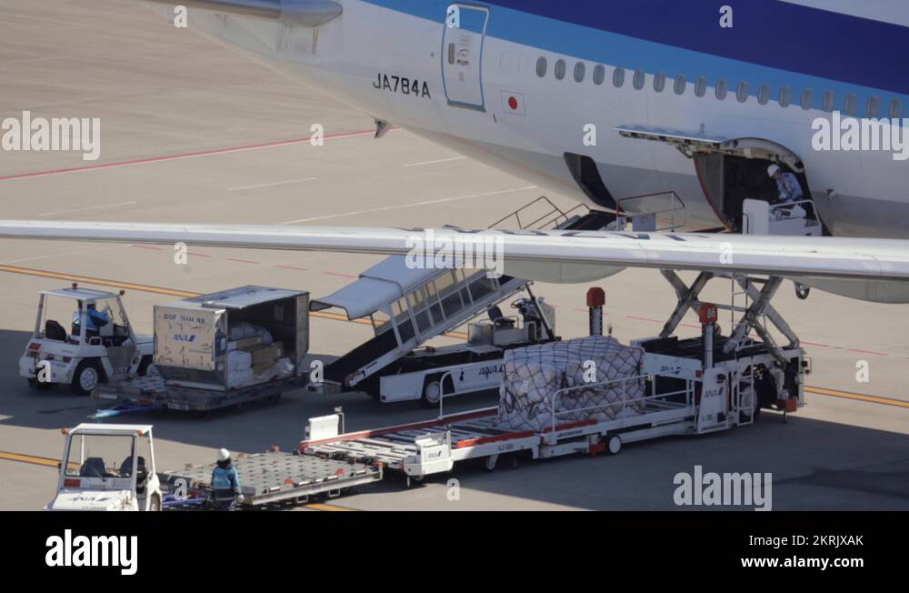 Airplane being loaded at Tokyo International Airport, Tokyo, Japan ...