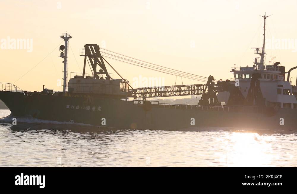 Ship at Tokyo Bay near Haneda airport at sunset, Tokyo, Japan Stock ...