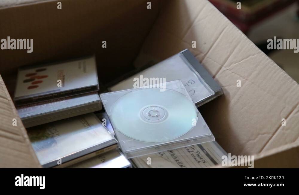 Cds paper cases Stock Videos & Footage - HD and 4K Video Clips - Alamy