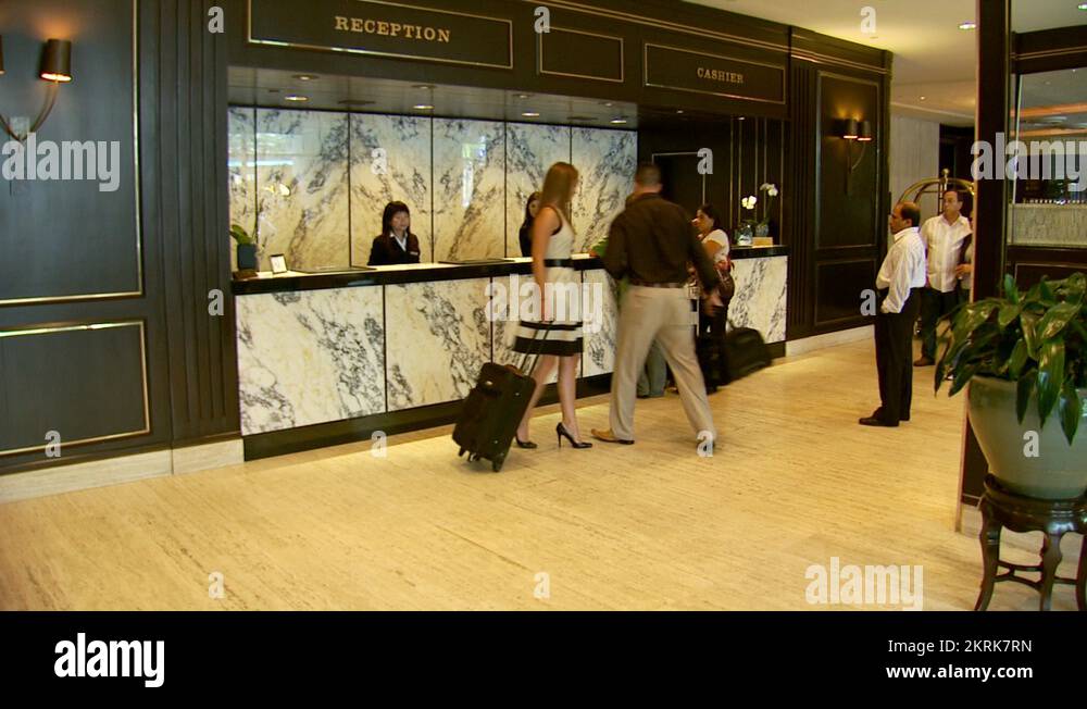 Checking in hotel lobby Stock Videos & Footage - HD and 4K Video Clips ...