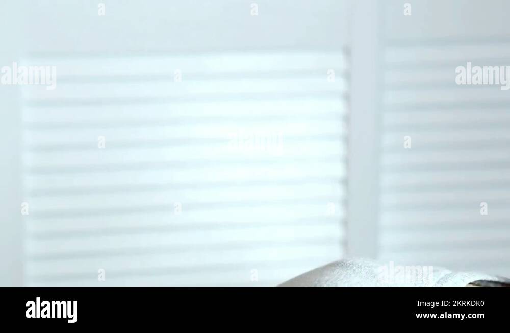 portrait of little caucasian boy smiling after crying. eyes full of ...