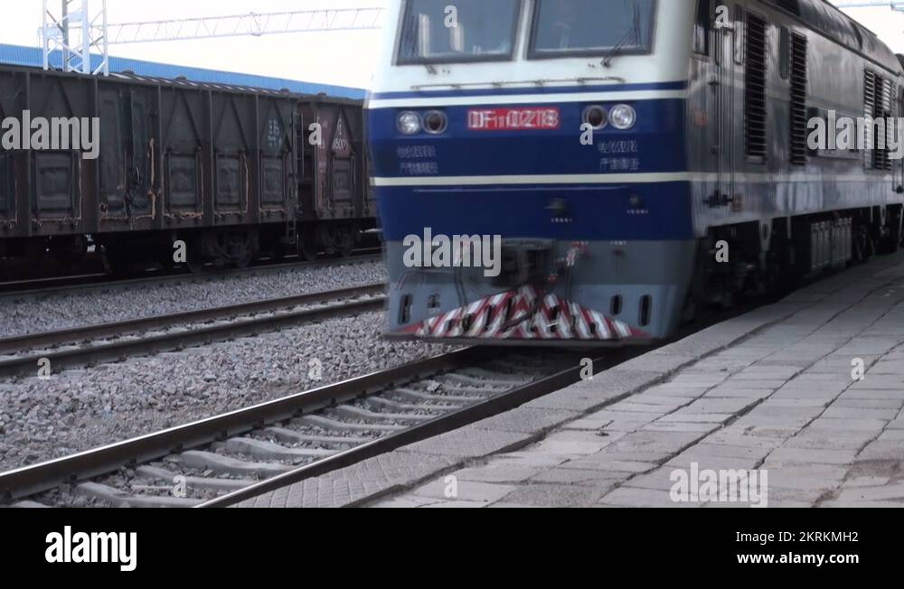 Chinese passenger train arrives at station, railways Stock Video ...