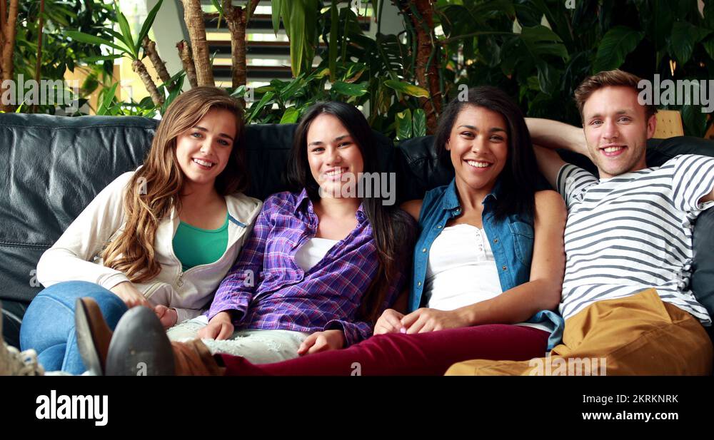 Positive friends sitting and thumbs up Stock Video Footage - Alamy