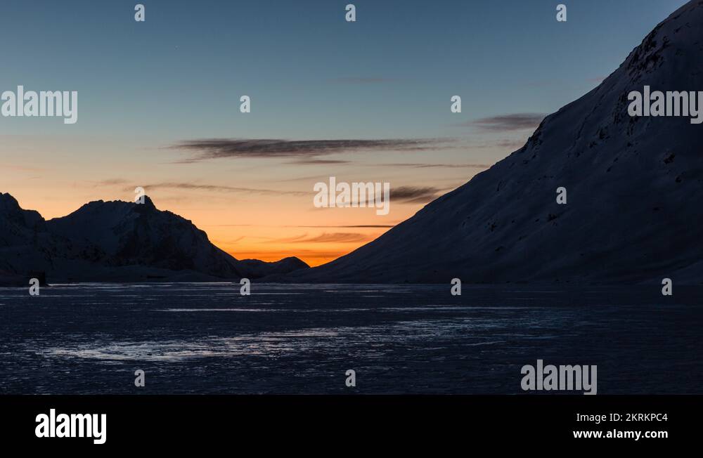 high altitude time lapse from night to day sunrise over mountain peak ...