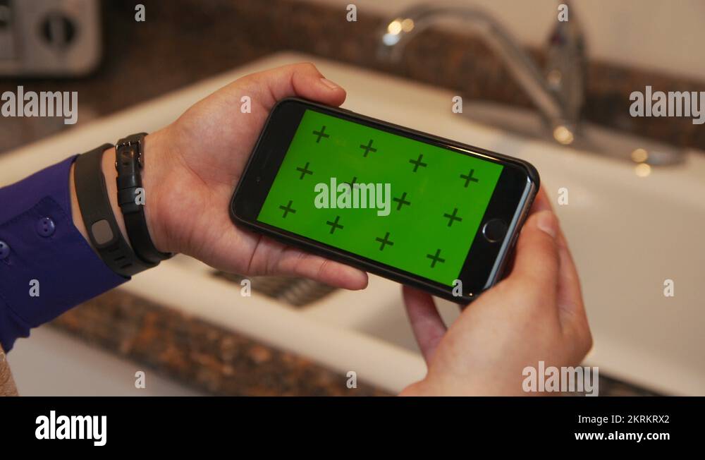 Tapping and Swiping iPhone 6 Green Screen in House Kitchen Stock Video ...